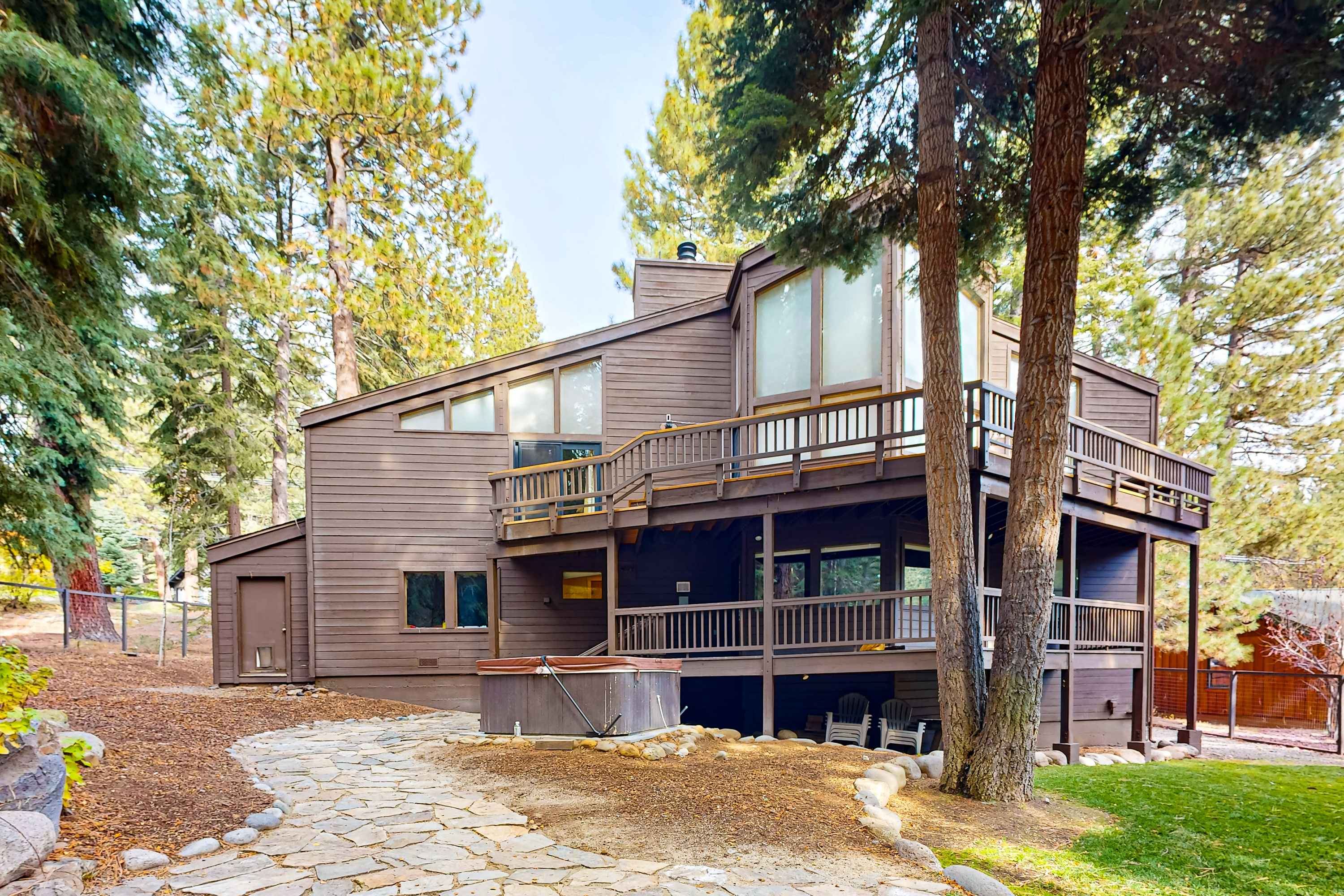 Serene home with fireplace, wood stove, kitchen, W&D, hot tub, & gas ...